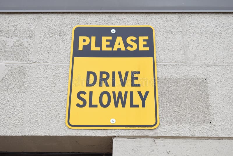 Please Drive Slowly Sign stock photo. Image of speed - 19315244