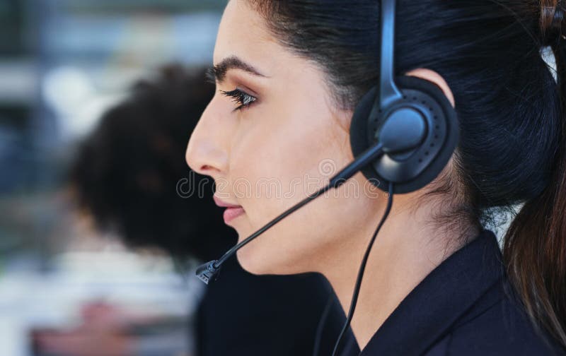 Please Hold while I Work on Resolving the Issue. a Young Woman Working ...