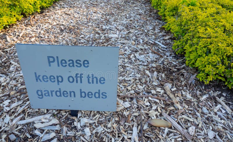 A `Please Keep Off the Garden Beds` a Square Warning Sign on Empty ...