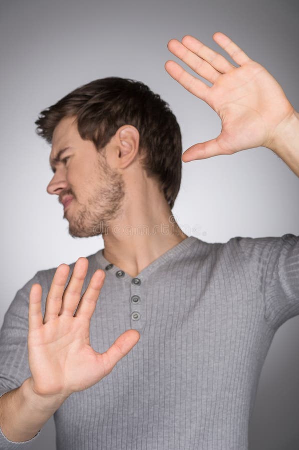 Please, No! Portrait of Young Men Expressing Negativity and Gesturing ...