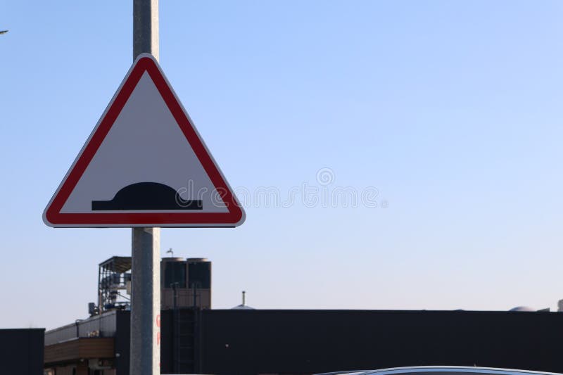 Please Proceed with Caution this Road Sign Indicates a Bump Ahead on ...