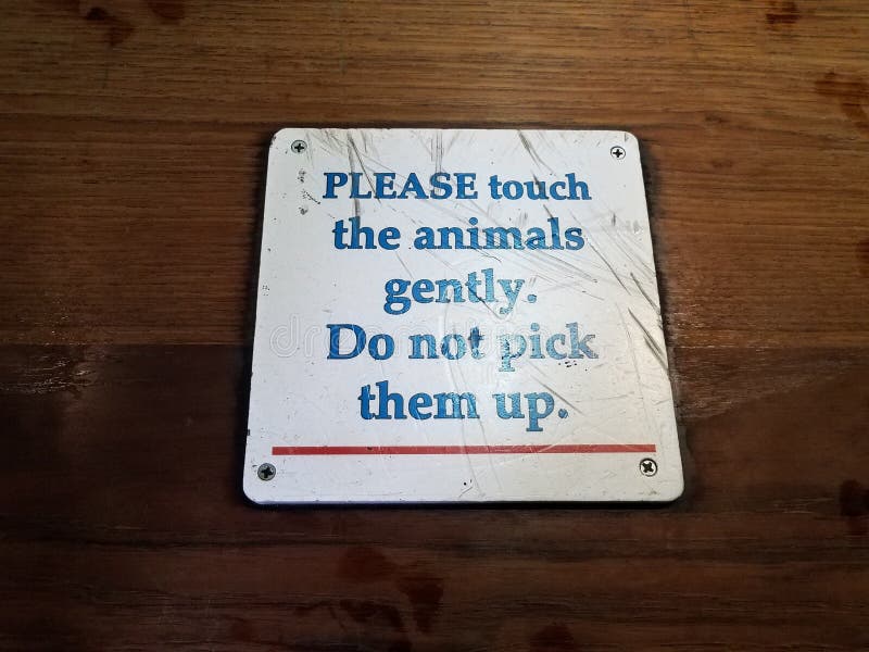 Please Touch the Animals Gently Do Not Pick Them Up Sign Stock Image ...