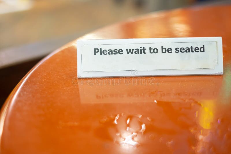 Please Wait To Seated Sign on Table Top at Restaurant Stock Image ...