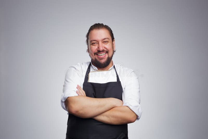 Pleased Chef Looking Confidently at the Camera and Laughing. Pro Stock ...