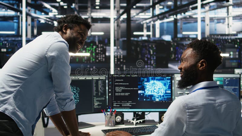 Pleased Data Center Manager Praising Work Done by Engineer Stock Photo ...