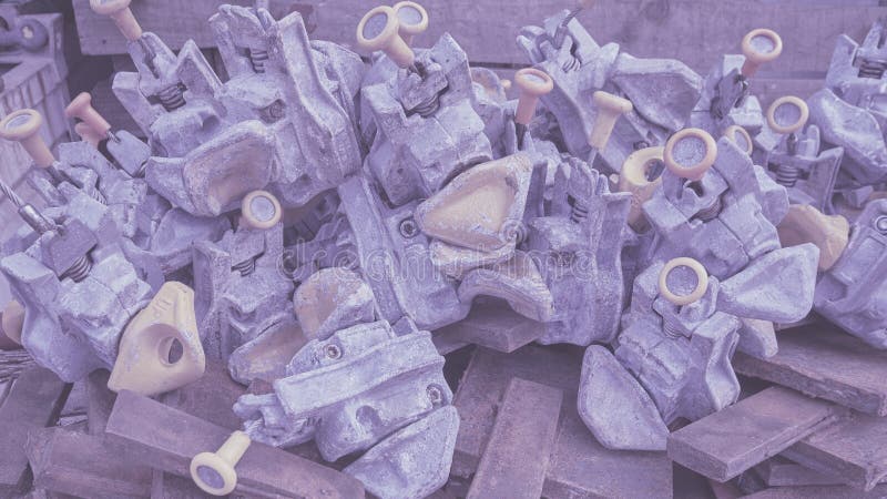 Plenty of Container Twistlocks Lying on a Bunch of Rusty Steel Stoppers ...