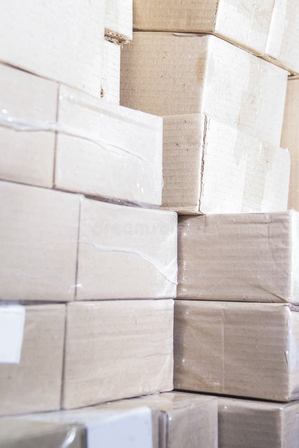 Plenty of Packaging Boxes Sealed with Plastic Bags Stock Image - Image ...