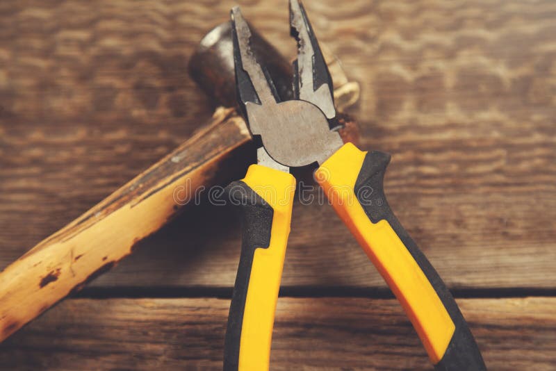 Pliers on hammer stock photo. Image of carpentry, work - 133037862
