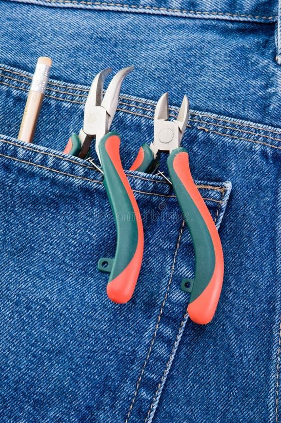 Pliers in jeans stock image. Image of shifting, wire - 17377339