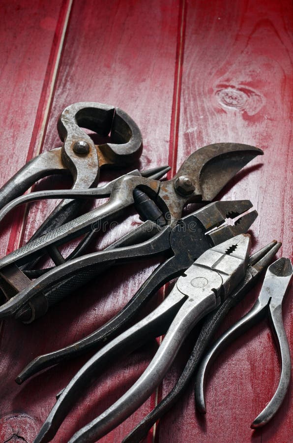 Pliers on Red stock photo. Image of wooden, repairing - 55125344