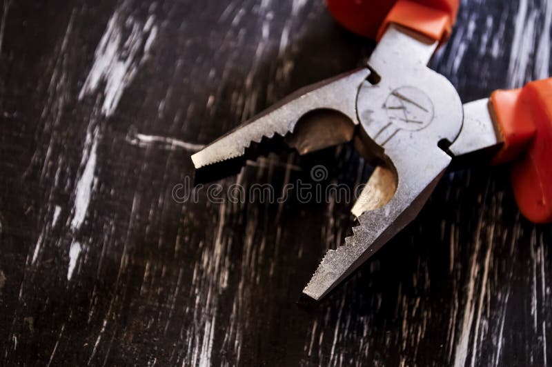 Pliers for Repair Work Lying on the Table. Repair Tools in the H Stock ...