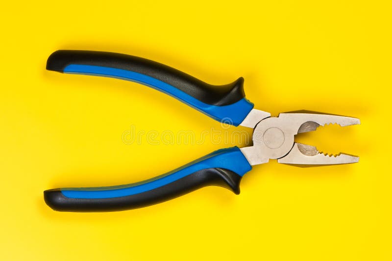 Pliers on Yellow Background. Stock Photo - Image of pincers, tool: 19298380
