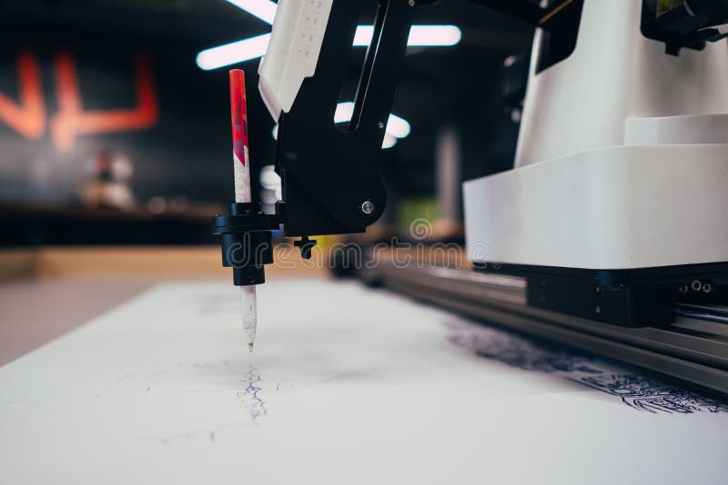 Plotter Draws a Pen Drawing on a Sheet of White Paper Stock Photo ...