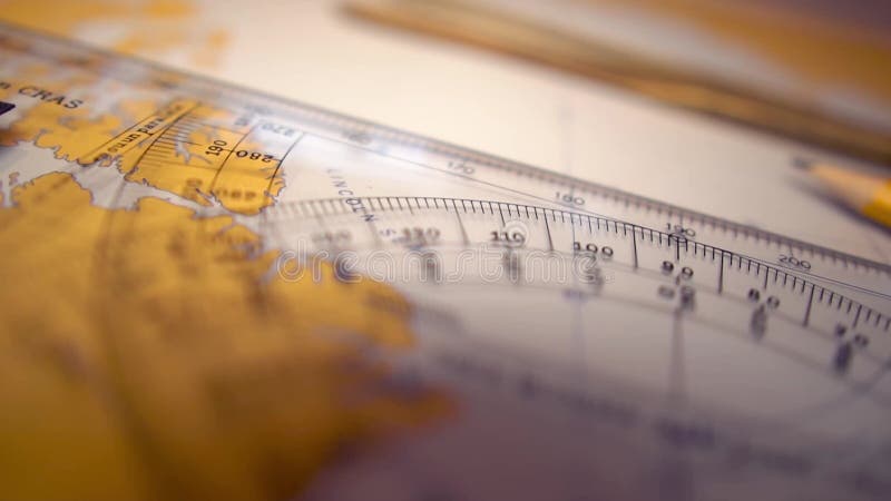 Plotting Position on Navigational Chart at Sea. Marine Map and Ruler ...