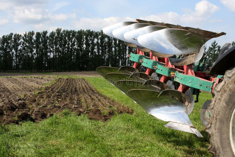 Plough and tractor stock image. Image of sowing, plough - 10575393