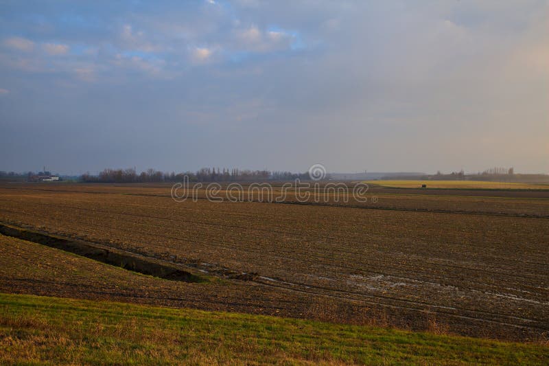 Ploughed Field with a Stream of Water at Sunset in Autumn Stock Image ...