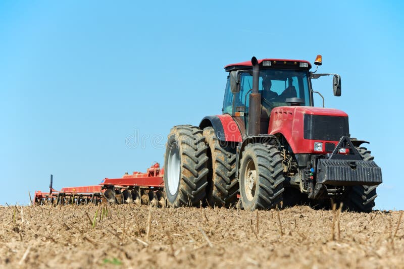 Ploughing Tractor at Field Cultivation Work Stock Image - Image of ...