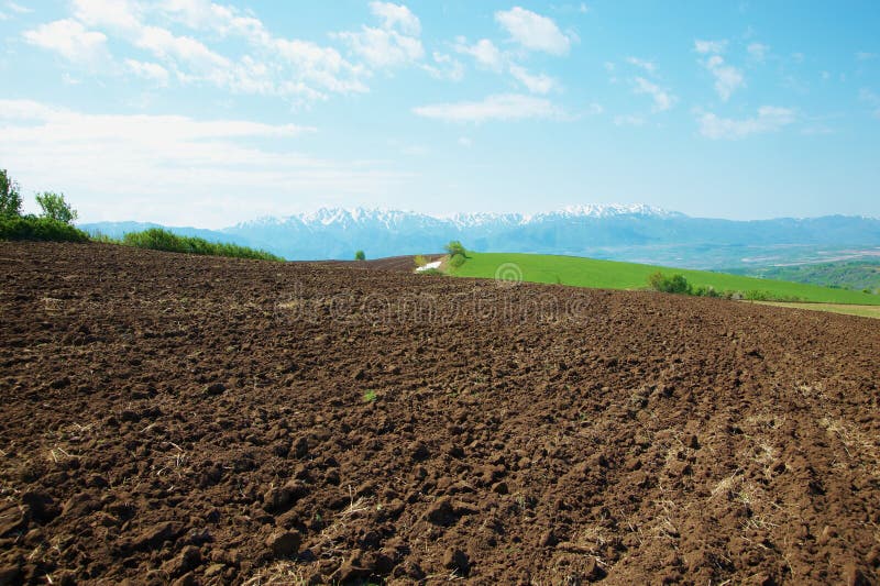 The plowed field stock photo. Image of clouds, farm, field - 19248658