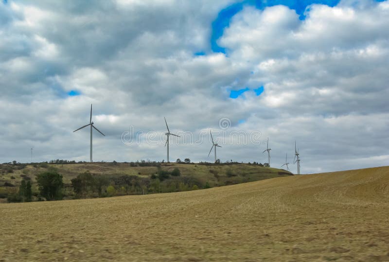 Plowed Field and Hill with Windmills in the Fall Stock Photo - Image of ...