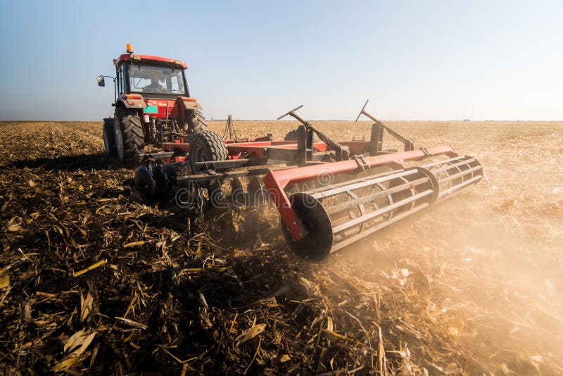 Plowing of stubble field stock photo. Image of machine - 139302646