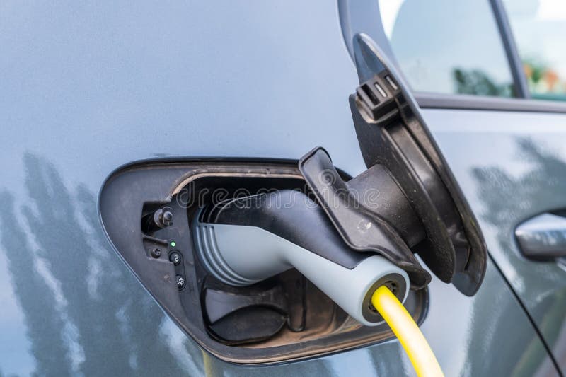 Plug of the Charging Cable is Plugged in Stock Photo - Image of nozzle ...