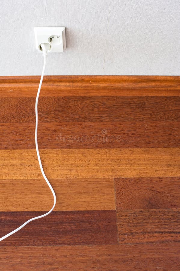 Plug Connected To the Outlet in a Wall. Stock Photo - Image of vertical ...
