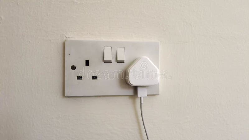 Plug in Electrical Appliance with Adapter and Switch on, UK British ...