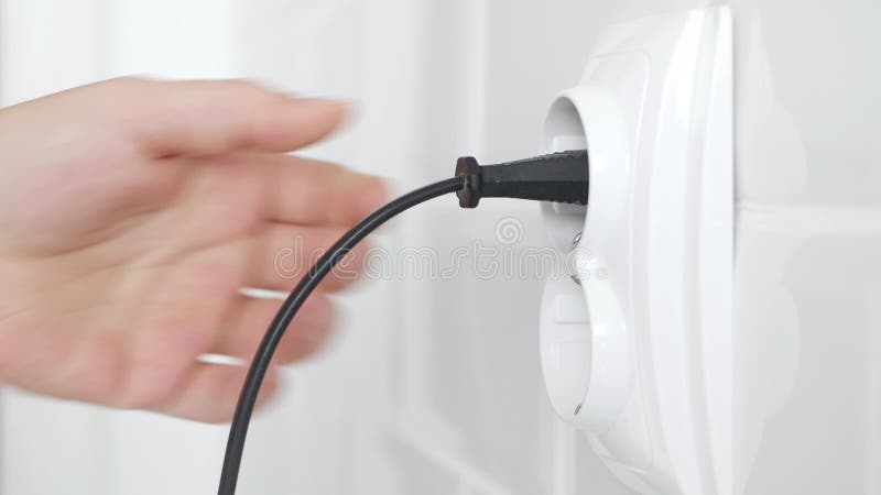 Plug in Electrical Cord in Socket, Plugging Devices, Electric Power ...