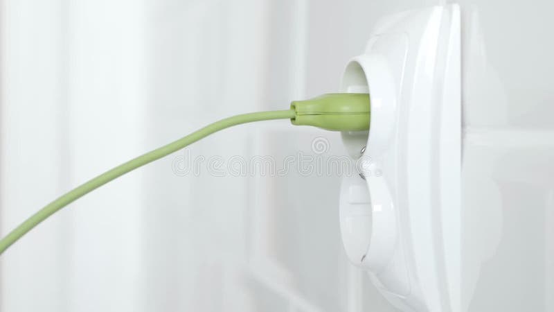 Plug in Electrical Cord in Socket, Plugging Devices, Electric Power ...