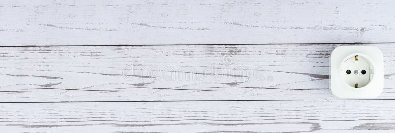 Socket on the wooden wall stock photo. Image of adapter - 210814226