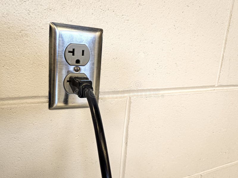 Black Cable Plug in Electrical Socket Closeup at an Angle Stock Image ...
