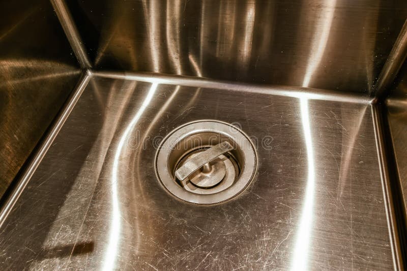 Plug in metal kitchen sink stock image. Image of stainless - 219093561