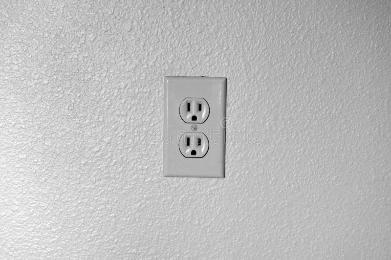 Wall Outlet - Yellow Plug stock image. Image of building - 2029091
