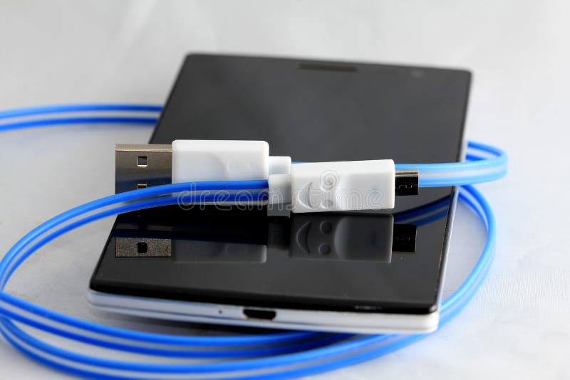 Plug the phone stock image. Image of closeup, cell, power - 44340575