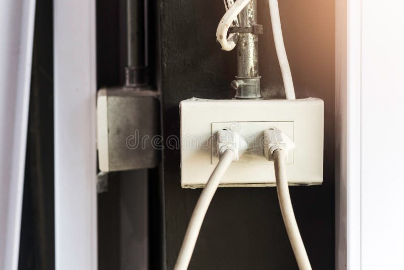 Plug is Plugged in Size we are Using Electronics. Stock Image - Image ...