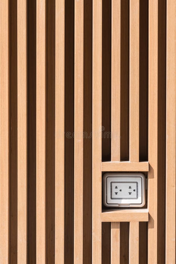 Plug Socket On Light Brown Wooden Wall Pattern Stock Image - Image of ...