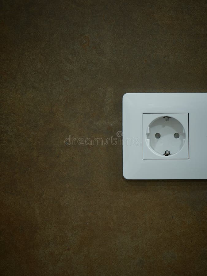 A Wall Socket in a Brown Background Stock Image - Image of circle, wall ...