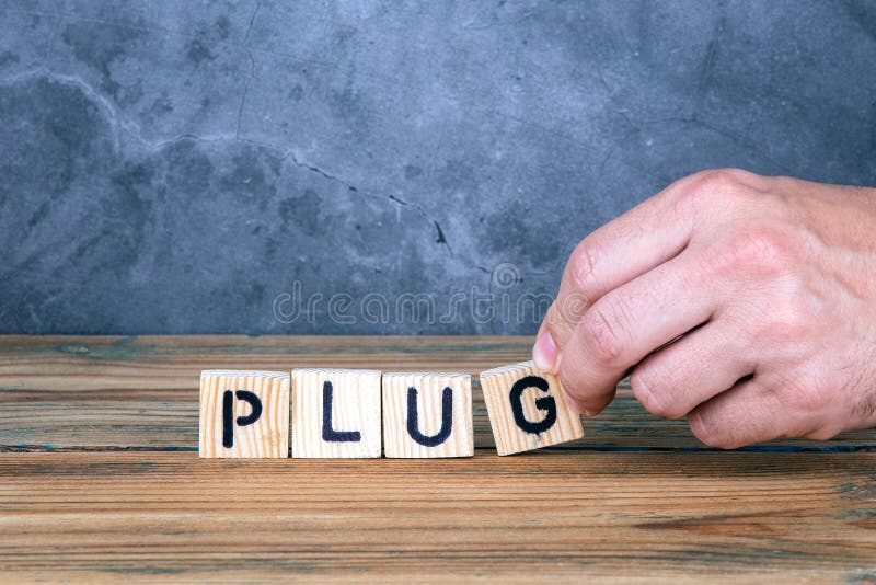 Plug - Word from Wooden Letters Stock Photo - Image of connector, hand ...