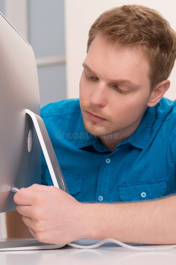 Plugging in the USB Cable stock photo. Image of digital - 22805118