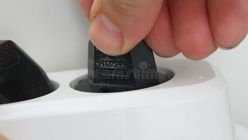 Plugging a Socket Plug into a Double Extension Cord Stock Image - Image ...