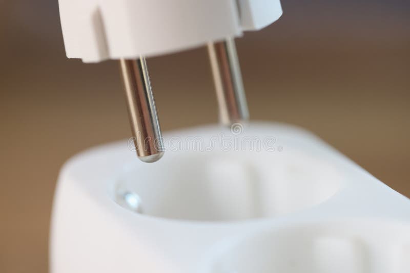 Plugging or Unplugging Electric Plug into Socket. Stock Image - Image ...