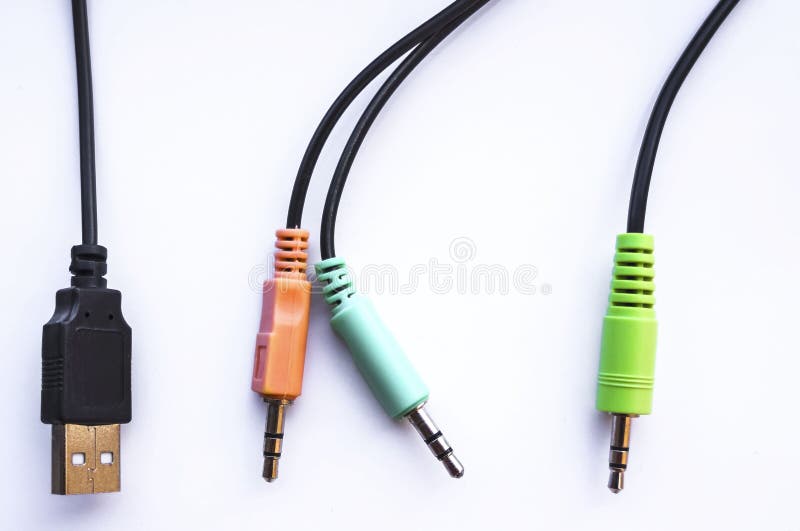 Plugs and Jacks. Four Different Black USB, Colored Plugs on on a Light ...