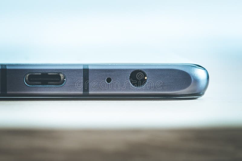 Plugs of a Modern Smartphone. Headphone Jack and Usb Type C Stock Photo ...