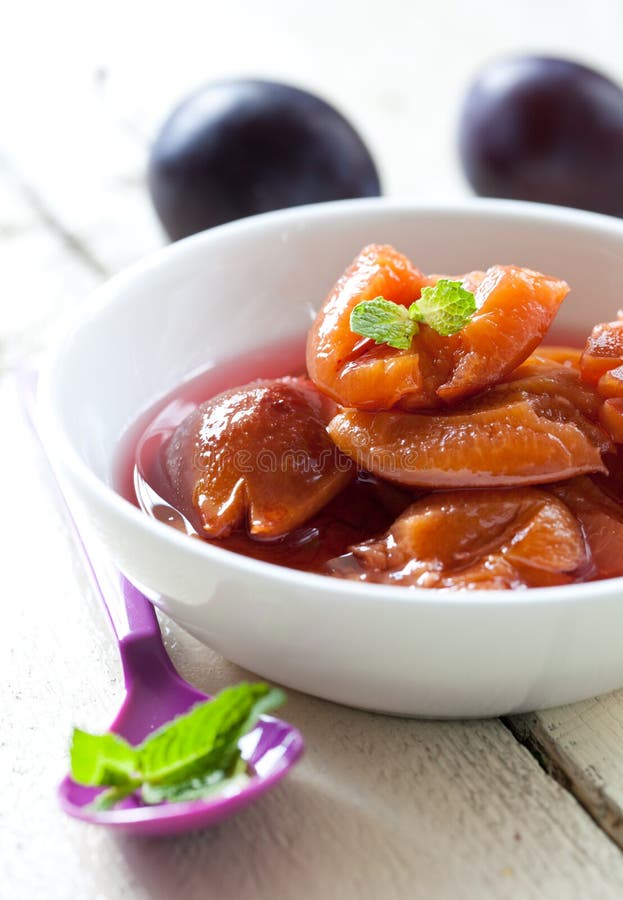 Plum compote in bowl stock image. Image of fruity, bowl - 20998591