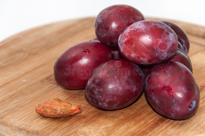 Plum Pit and Fresh Plums on the Board Stock Image - Image of fresh ...