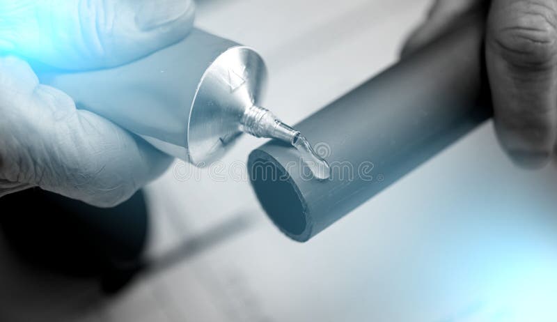 Plumber Applying Glue on Pvc Pipe Light Effect Stock Image - Image of ...