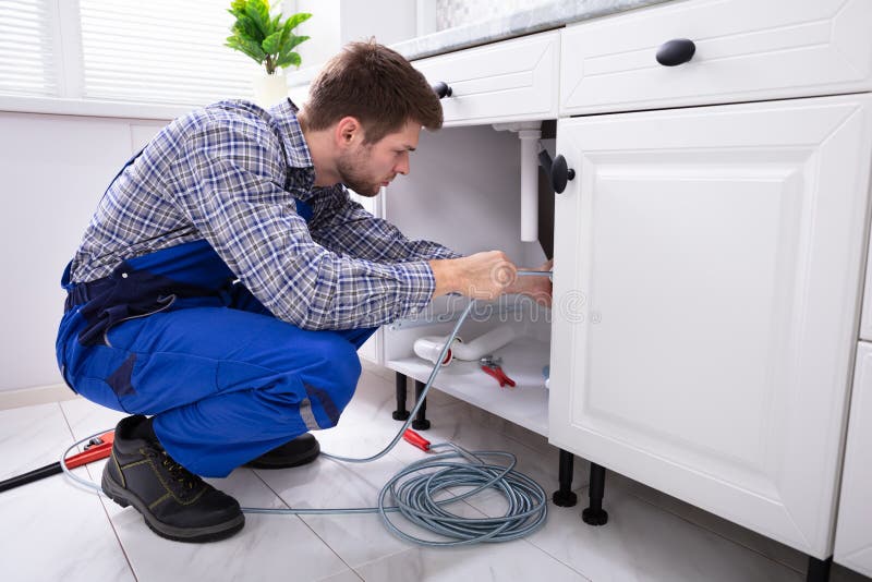 Plumber. stock image. Image of handsome, caucasian, kitchen - 81354171
