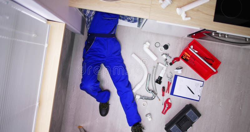 Plumber Cleaning Pipe. Unclog Drain Stock Image - Image of young ...