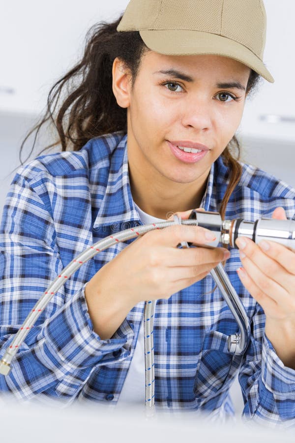 Plumber Connecting Pipe To Tap Stock Photo - Image of profession ...