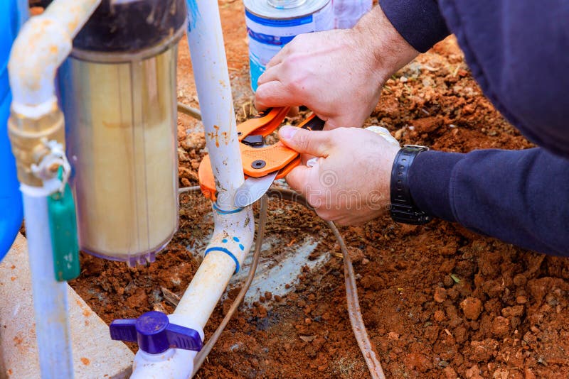 Plumber Cuts Plastic PVC Pipe Using a Special Pair of Scissors Stock ...